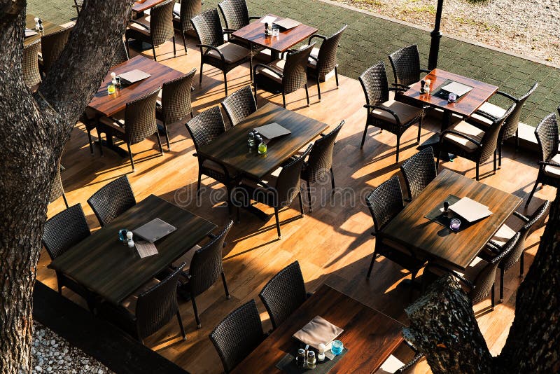 Top Down View of Tables and Chairs in Empty Cafe in Rays of Morning ...