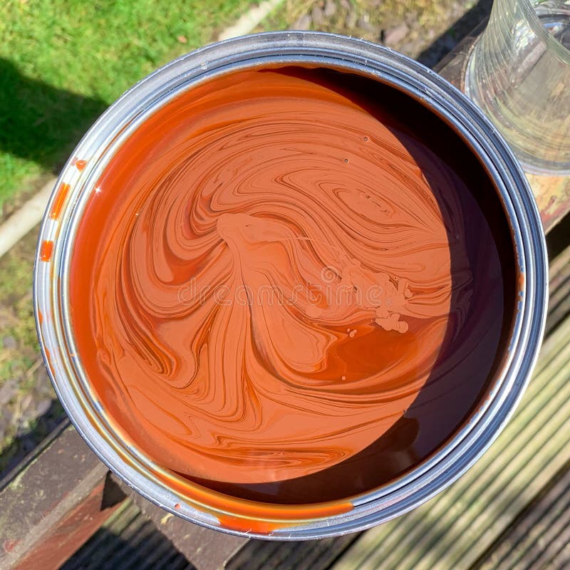 A Top Down View of a Tin of Red Paint Showing the Oils it Contains ...