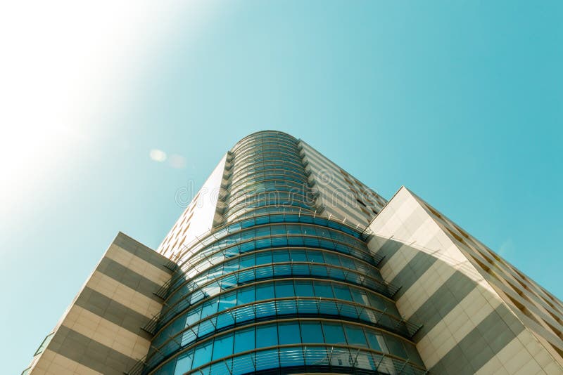 Top of Huge Business Building from Bottom View and Solid Sky Stock ...