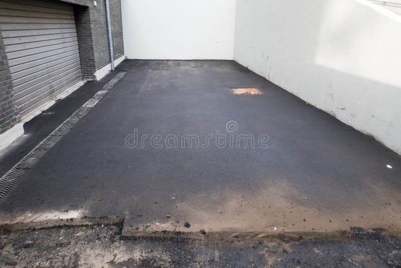 Top layer of asphalt stock photo. Image of laying, machine - 165508960