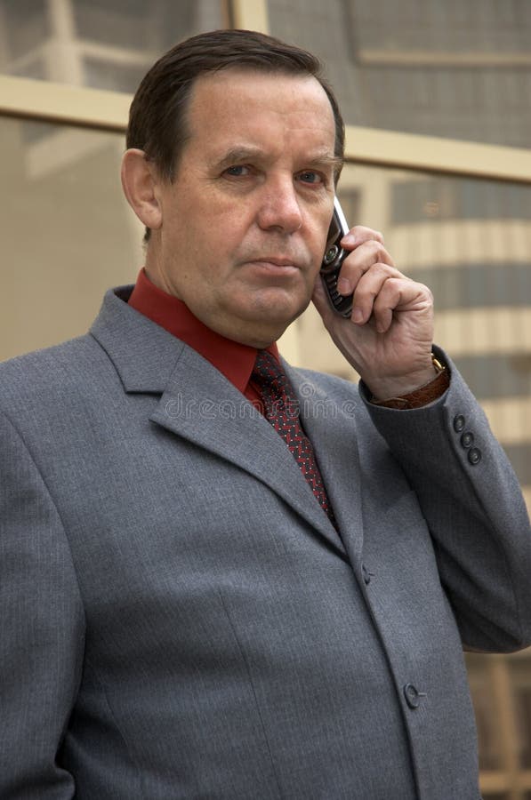 Top manager with cellphone stock image. Image of exchange - 272593