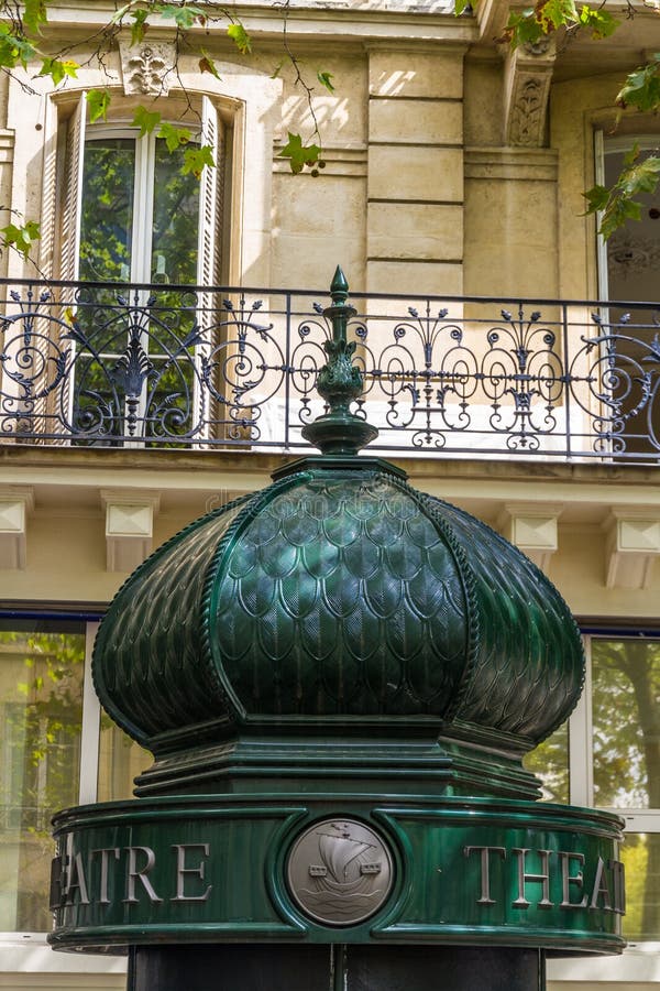 Top of Morris Column in Paris, France Stock Image - Image of france ...