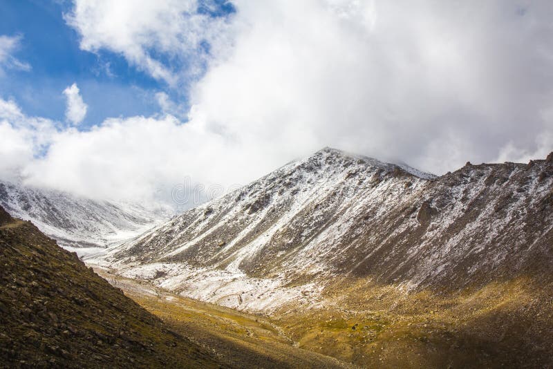 Mountain Covered Snow and Cloudy Stock Image - Image of tourism, white ...