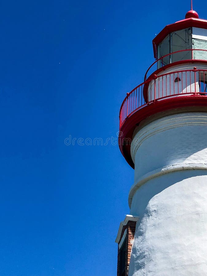 Top of Lighthouse by Blue Sky Background Stock Image - Image of blue ...