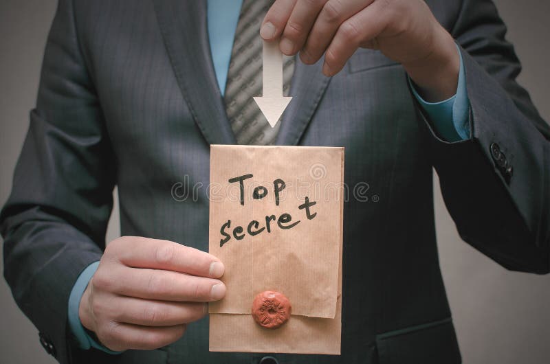 Top Secret Concept. Business Man Showing a Top Secret Documents or ...