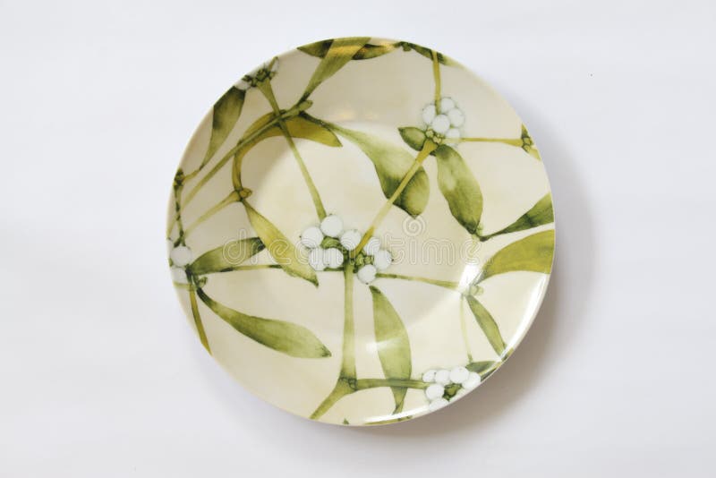Top Shot of Ceramic Dining Plates with Floral and Leaf Design Stock ...