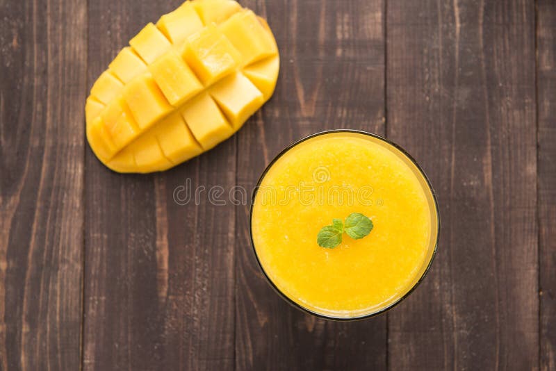 Top Shot Mango Smoothie and Mango on Wooden Table Stock Photo - Image ...