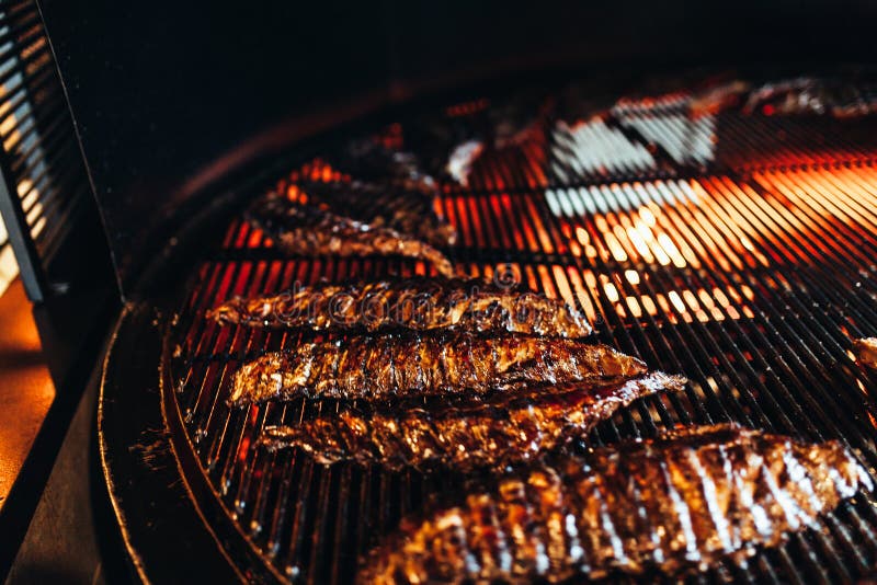 A Top Sirloin Steak Flame Broiled on a Barbecue, Shallow Depth of Field ...