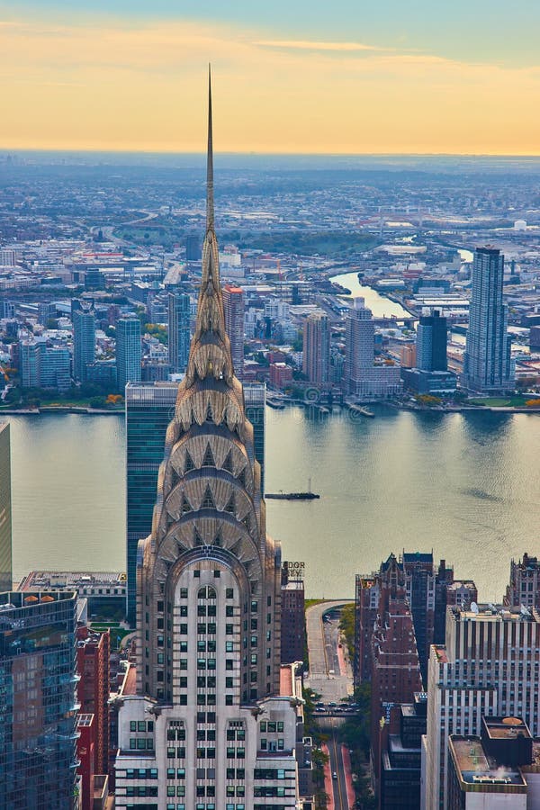 Top of Stunning New York City Skyscraper Vertical Overlooking River and ...