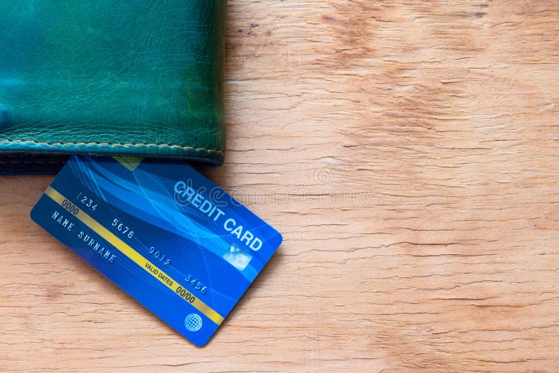 Top Table View of Mock Up Blue Credit Card Insert between Wallet with ...