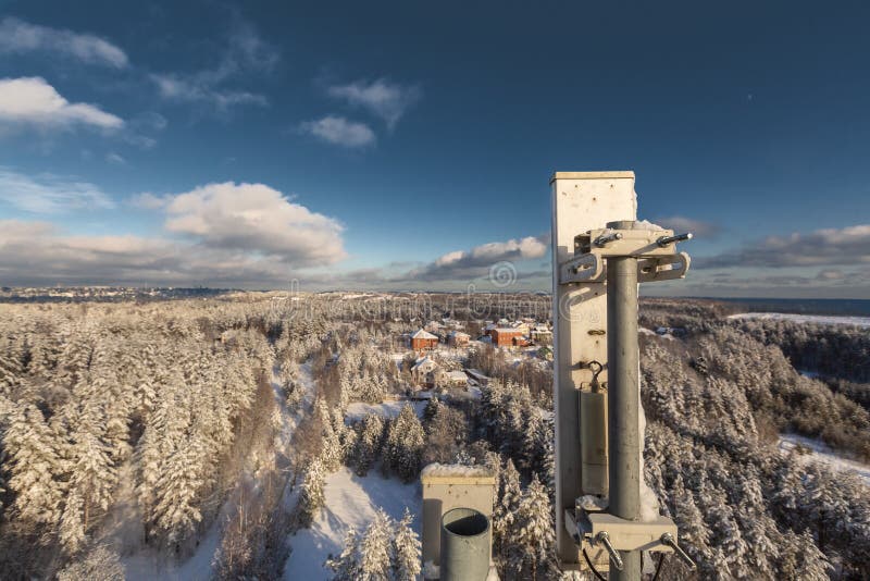 Top of Telecommunication Tower with Vertical Panel Antennas and Remote ...
