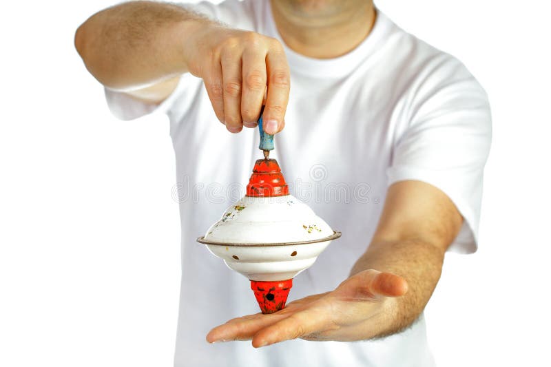 Top toy in hands stock image. Image of youth, turn, spinning - 44421907