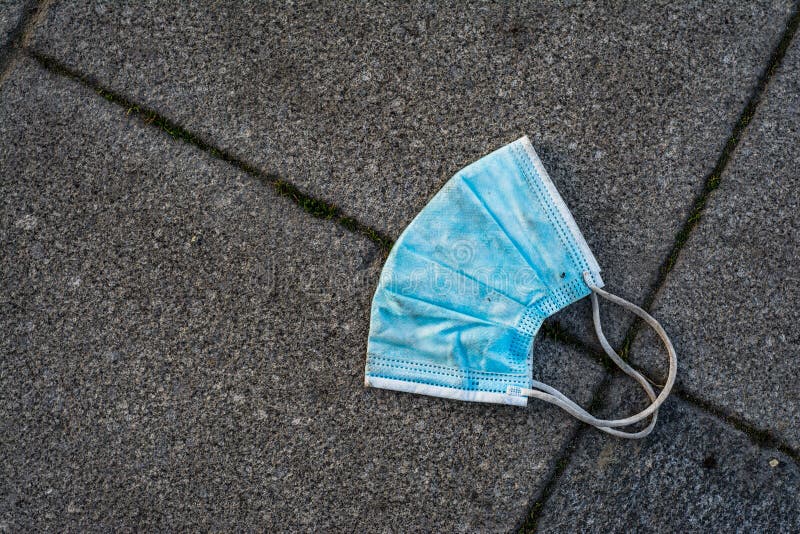 Top View of an Abandoned Protective Mask on the Floor Stock Photo ...