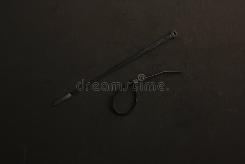Top View of Adjustable Plastic Clamps on a Black Surface Stock Image ...