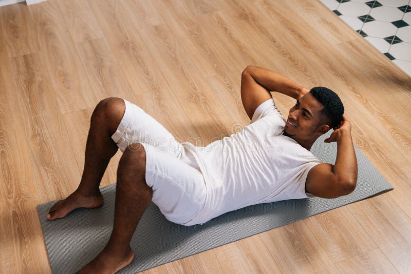 Top View of African-American Man Practicing Abs Crunches, Training ...