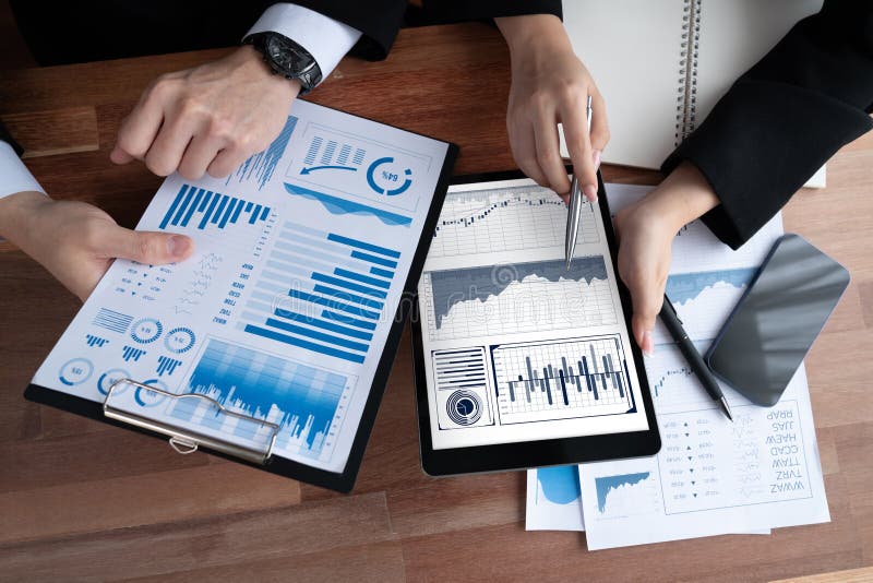 Top View Analyst Team with Analysis Data on Tablet Screen. Jubilant ...