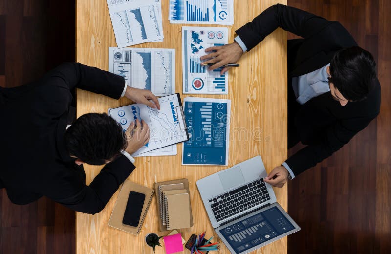 Top View Analyst Team Working on Dashboard Paper on Table. Fervent ...