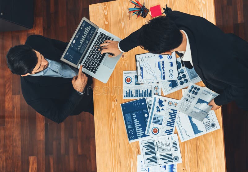 Top View Analyst Team Working on Dashboard Paper on Table. Fervent ...