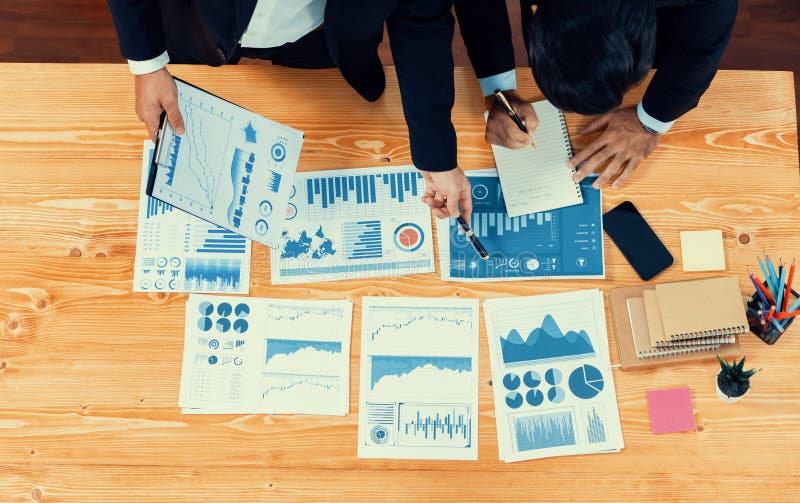 Top View Analyst Team Working on Dashboard Paper on Table. Fervent ...
