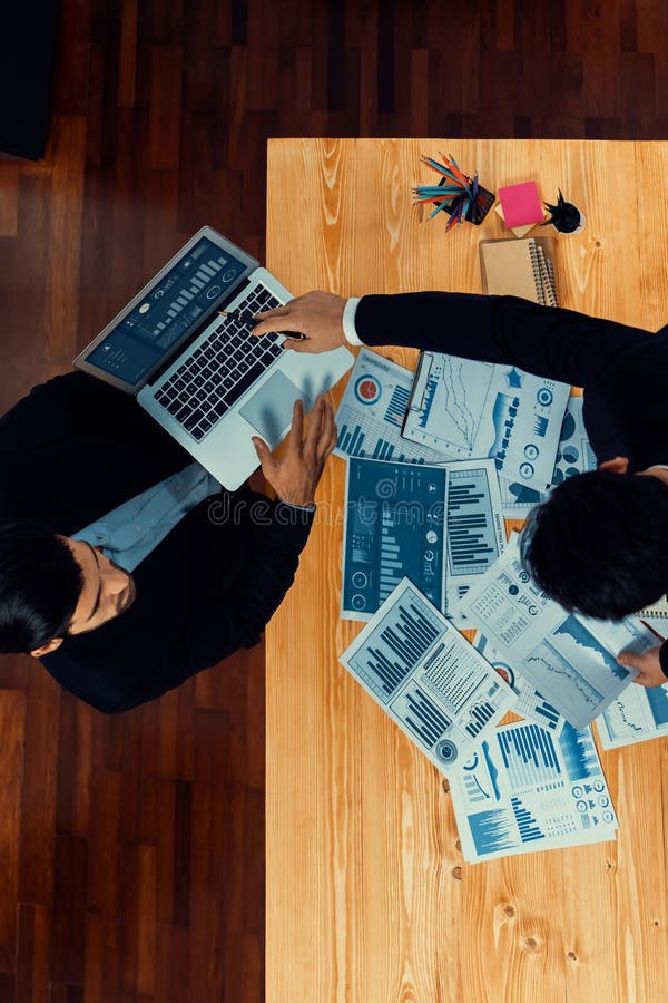 Top View Analyst Team Working on Dashboard Paper on Table. Fervent ...