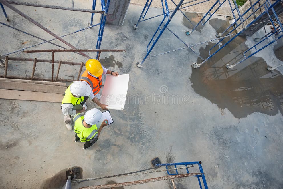 Top View of Architects Engineer are Discussing about the Progress of ...