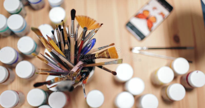 Top View of Artist Workplace with Paints and Brushes Stock Footage ...