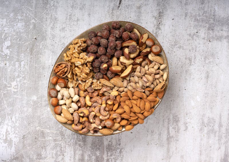 Top View of Assorted Different Types of Nuts on a Plate Stock Image ...