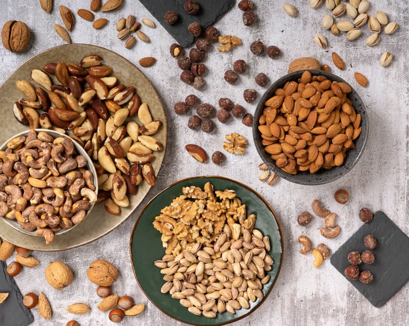 Top View of Assorted Different Types of Nuts on a Plate Stock Photo ...