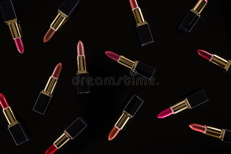 Top View of Assorted Lipsticks in Luxury Tubes Isolated on Black Stock ...