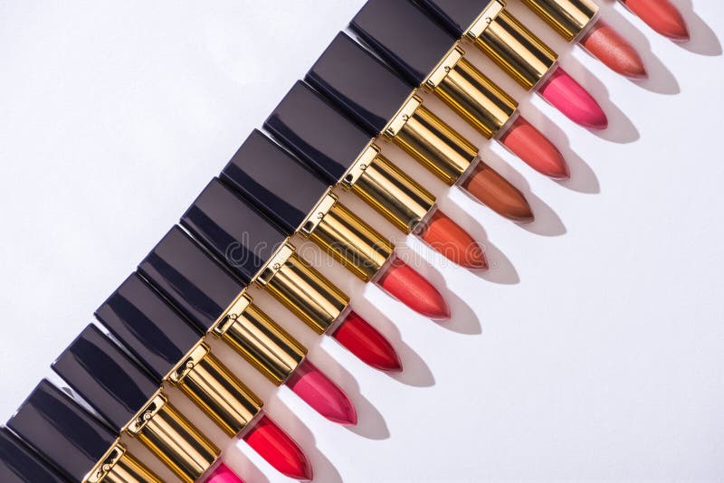 Top View of Assorted Lipsticks in Luxury Tubes in Line on White ...