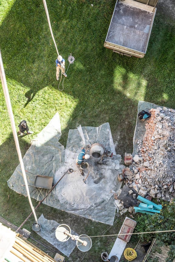 Top View of Authentic Builder Men Working with Shovel during Concrete ...