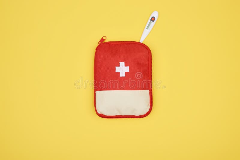 Top View of Automotive First Aid Kit with Electronic Thermometer Stock ...
