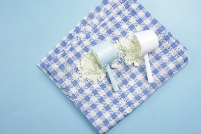 Top View of Baby Milk Powder and Spoon on Blue Stock Photo - Image of ...