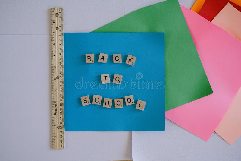 Top View of "back To School" Scrabble Letters on Colorful Sheets with a ...