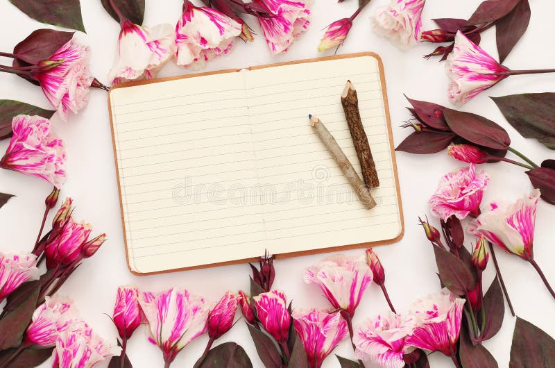 Top View of Beautiful Flowers and Open Blank Notebook Stock Image ...