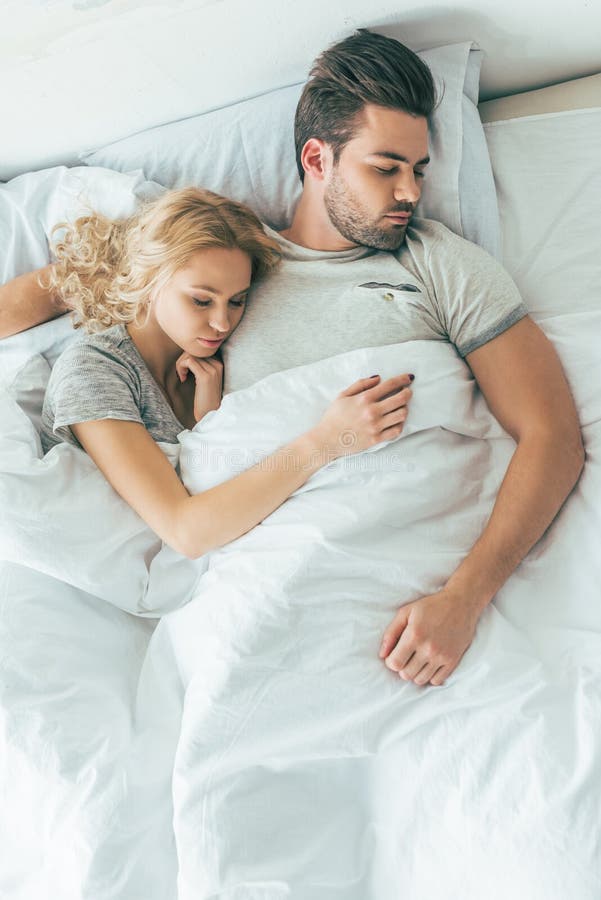Top View of Beautiful Young Couple Sleeping Together Stock Photo ... Top View of Beautiful Young Couple Sleeping Together Stock Photo ...