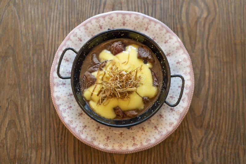 Top View of a Beef Dish with Melted Cheese on Top Stock Photo - Image ...