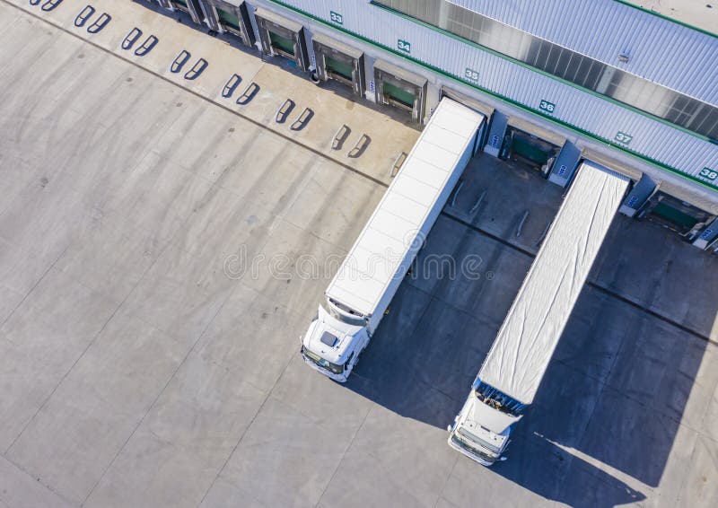 Top View at a Big Distribution Warehouse with Gates for Loads and ...