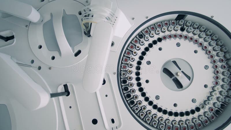 Top View of Biochemical Analyzer Taking Probes from Test Tubes with ...