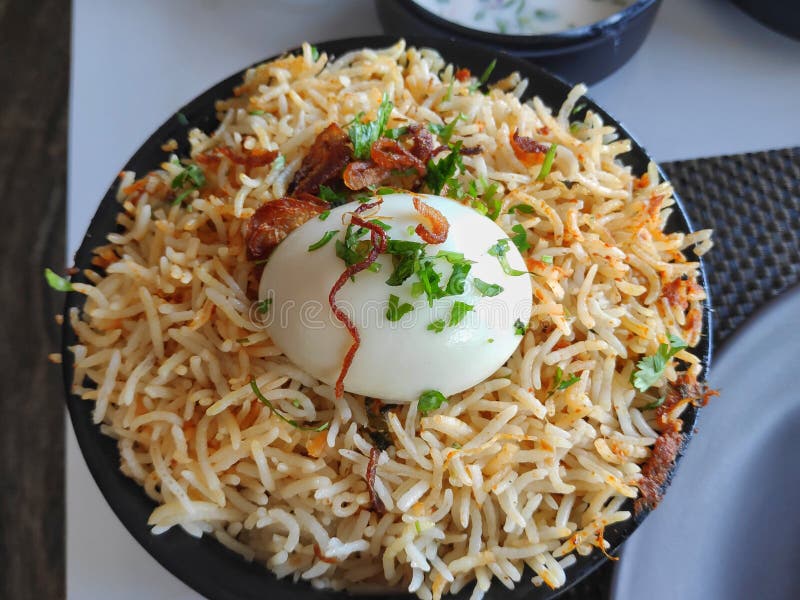 Top View Biryani with Egg Garnished Stock Photo - Image of noodle ...