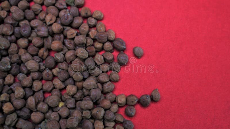 Top View of Black Chickpeas on the Red Surface - Space for Text Stock ...