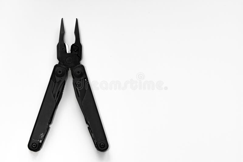 Top View of Black Pliers of Multi Tool Multitool on White Backround ...