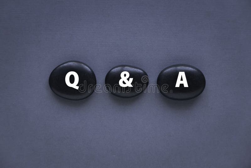 Top View of a Black Stones Written with Q&a Question and Answer on a ...