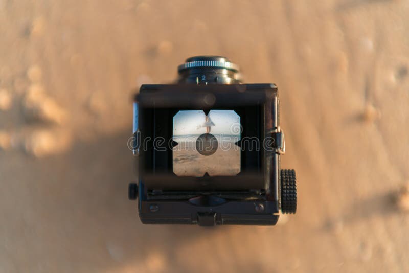 Top View of a Black Twin-lens Reflex Camera on the Sand Stock Image ...