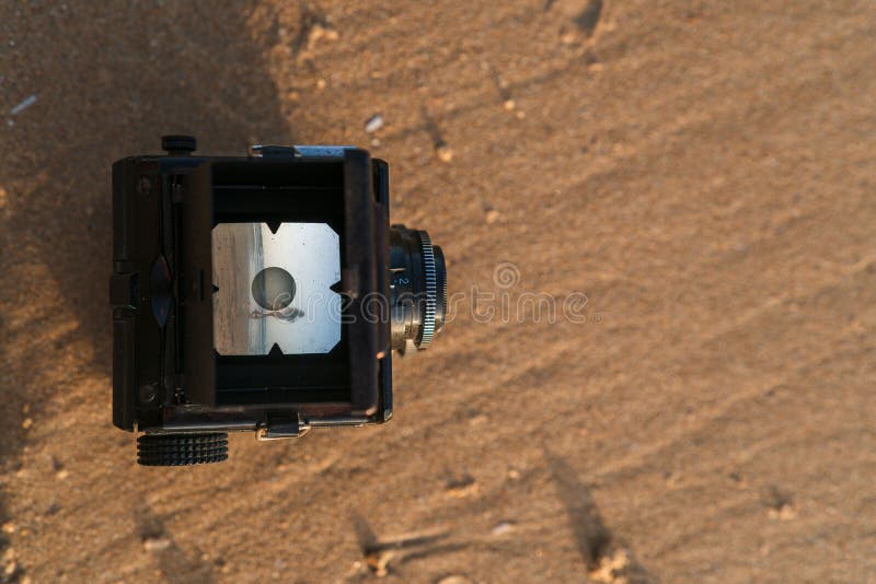 Top View of a Black Twin-lens Reflex Camera on the Sand Stock Image ...