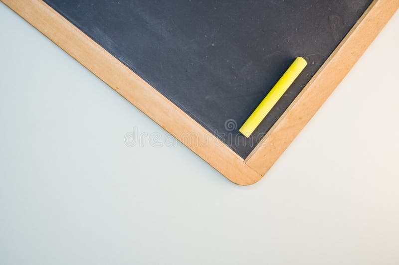 Top View of the Blackboard with Chalk on the Orange Surface Stock Photo ...