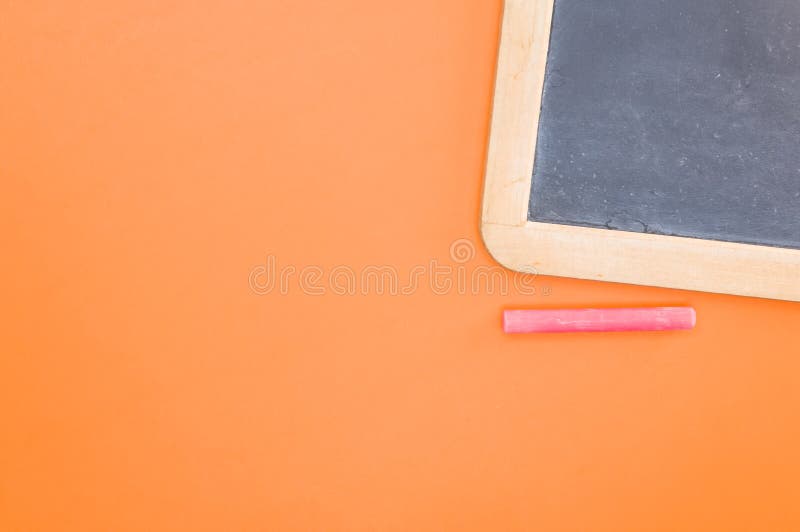 Top View of the Blackboard with Chalk on the Orange Surface Stock Image ...
