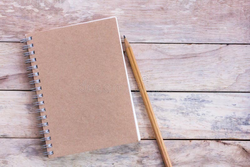 Top View with Blank Empty Notepad and Pencil on Wood Table. Stock Image ...