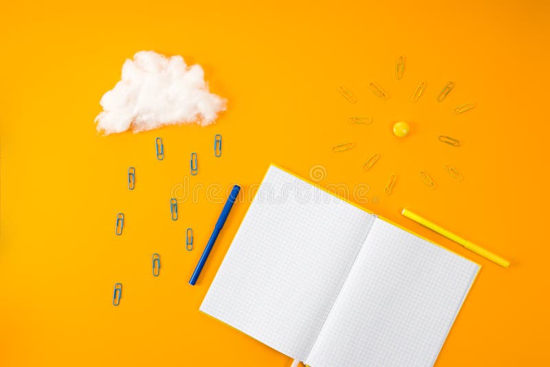 Top View of Blank Notebook and Cloud with Sun Made of Paper Clips and ...