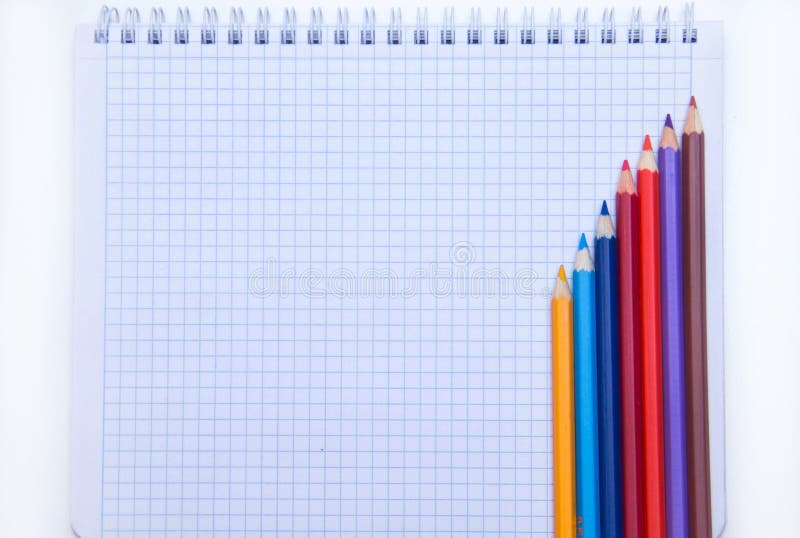 Top View of Blank Notebook Page with Colored Pencils on Table. Flat Lay ...